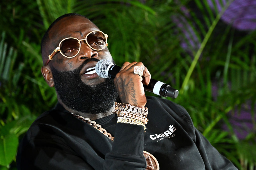 Rick Ross Explains Viral Diving Fail: "My Knees Caught A Flat"