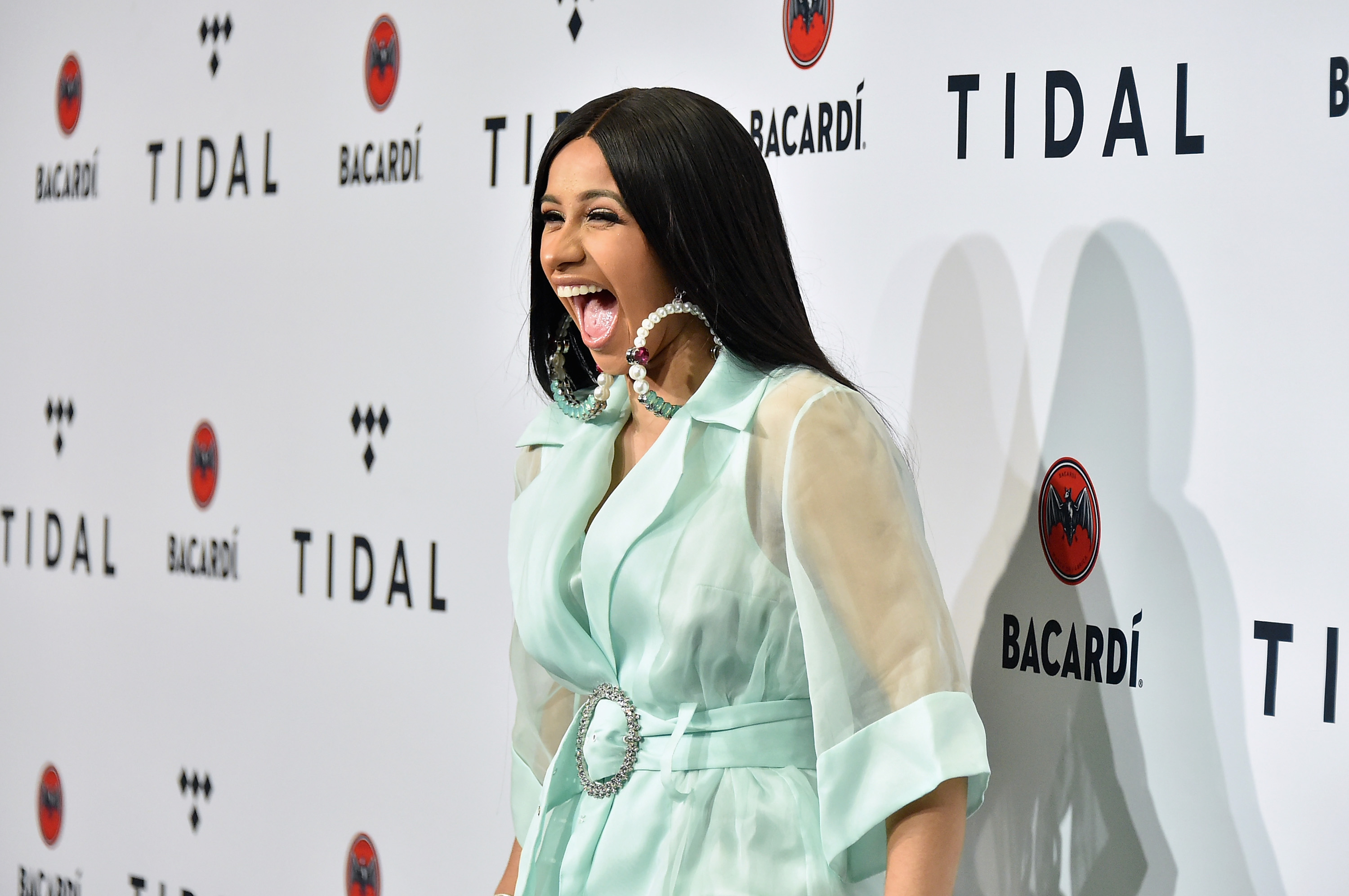 Cardi B Shares Throwback Photo As A 7-Year-Old With Crooked Teeth