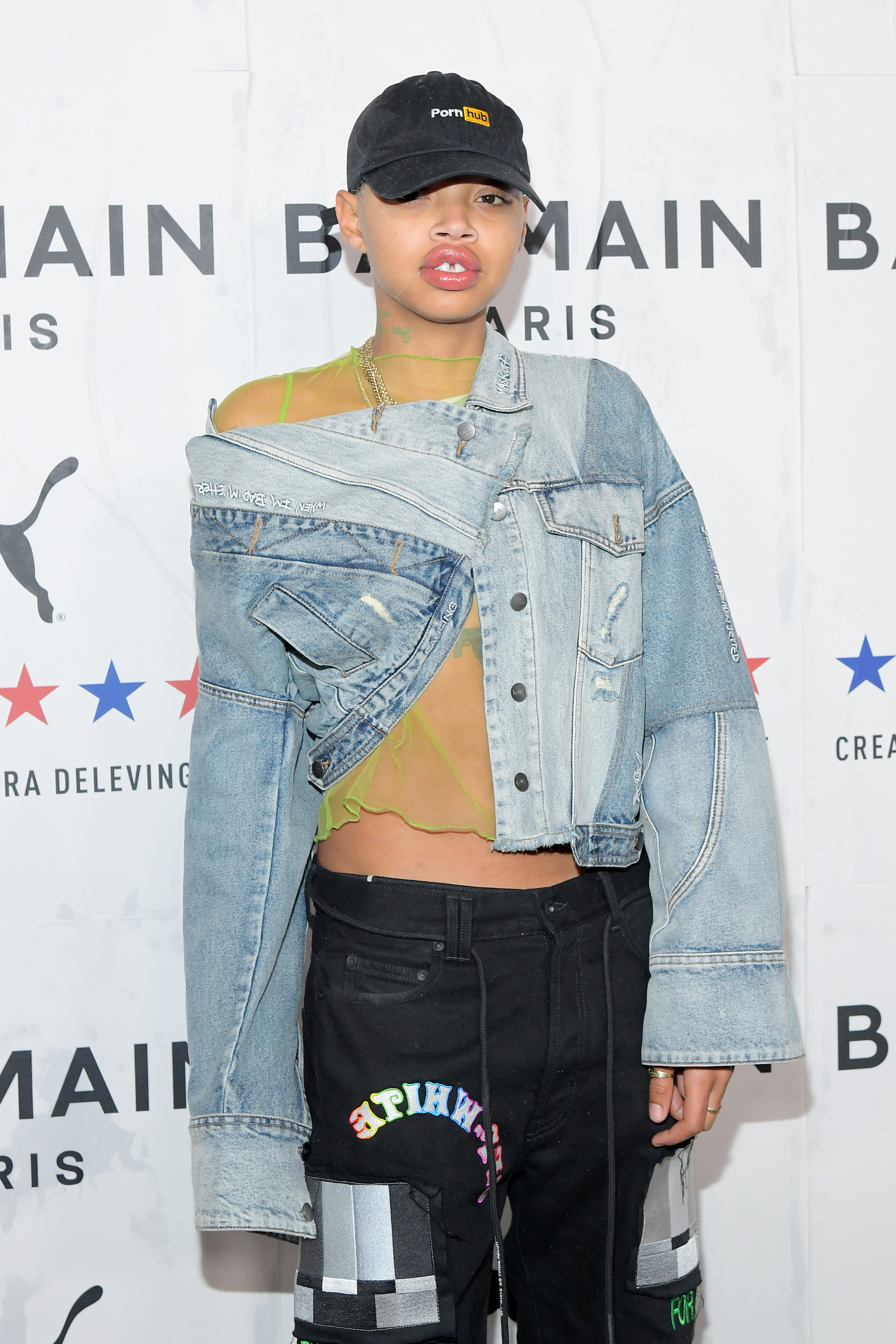 Slick Woods Debuts Large Nipsey Hussle-Inspired Face Tattoo