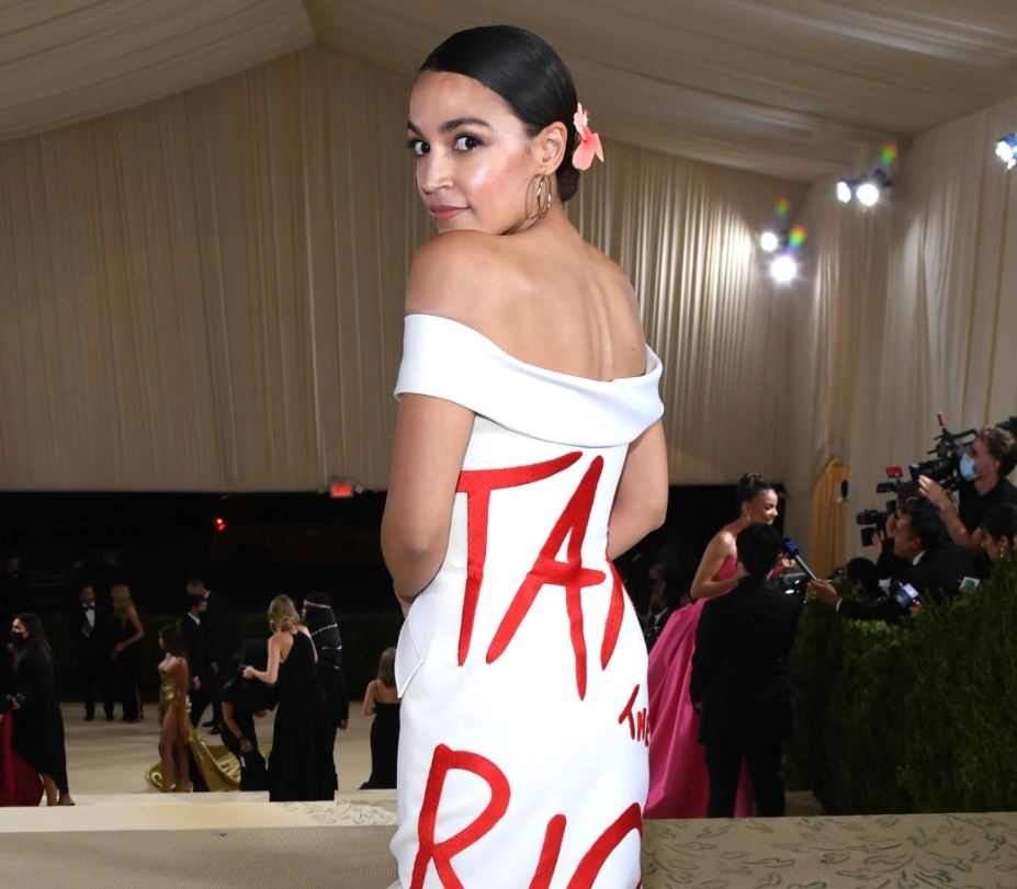 AOC Wears "Tax The Rich" Gown At Met Gala & Critics Light Up Social Media