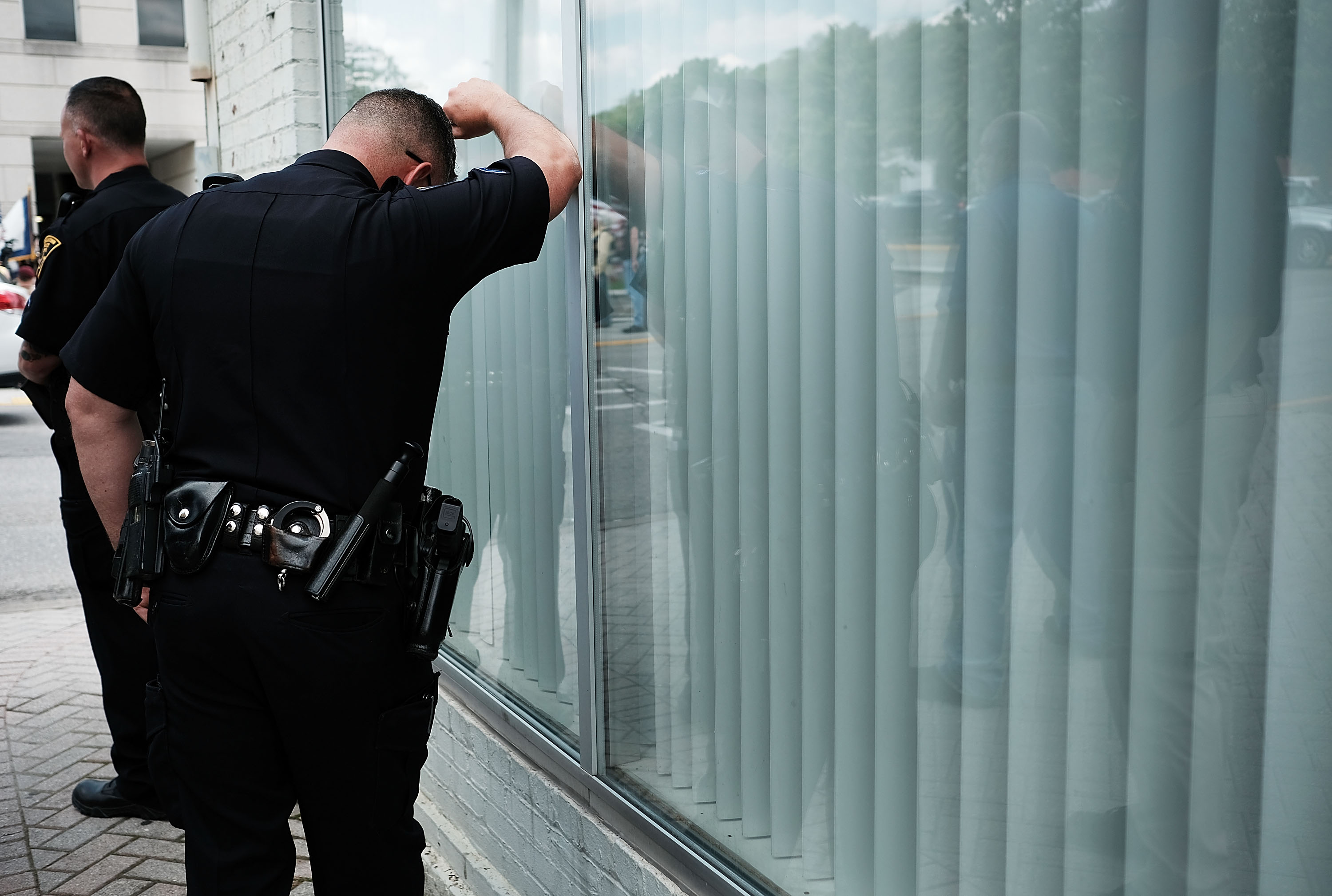 Police Officer Wins Settlement After Being Fired For Not Shooting A