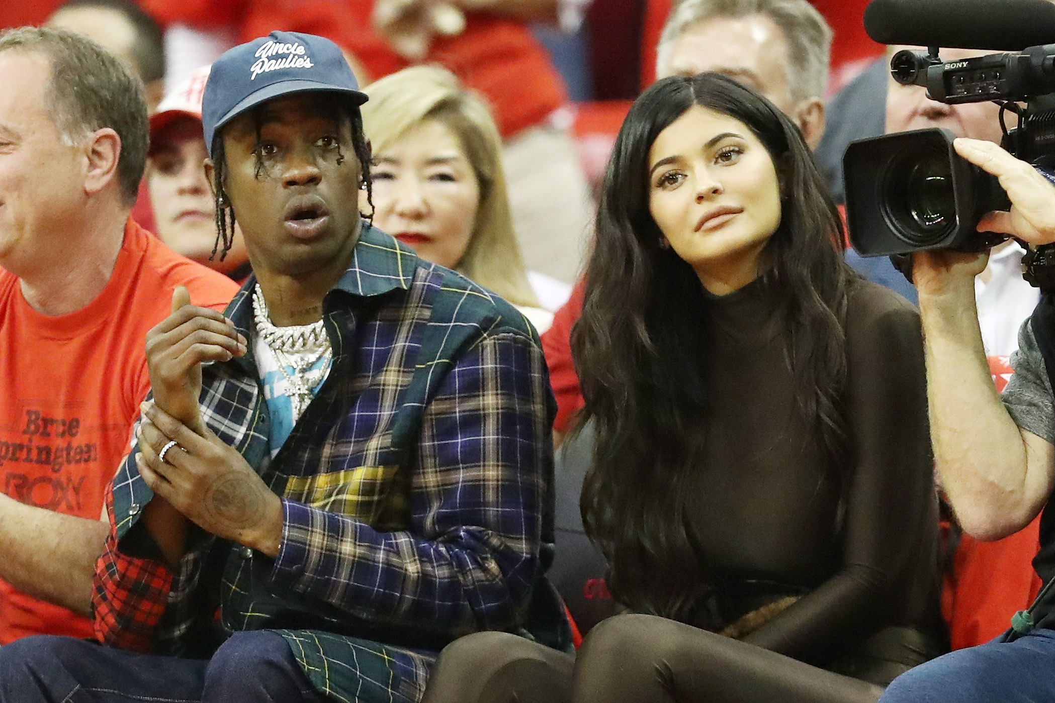Travis Scott & Kylie Jenner Sit Court Side At Rockets Game 7