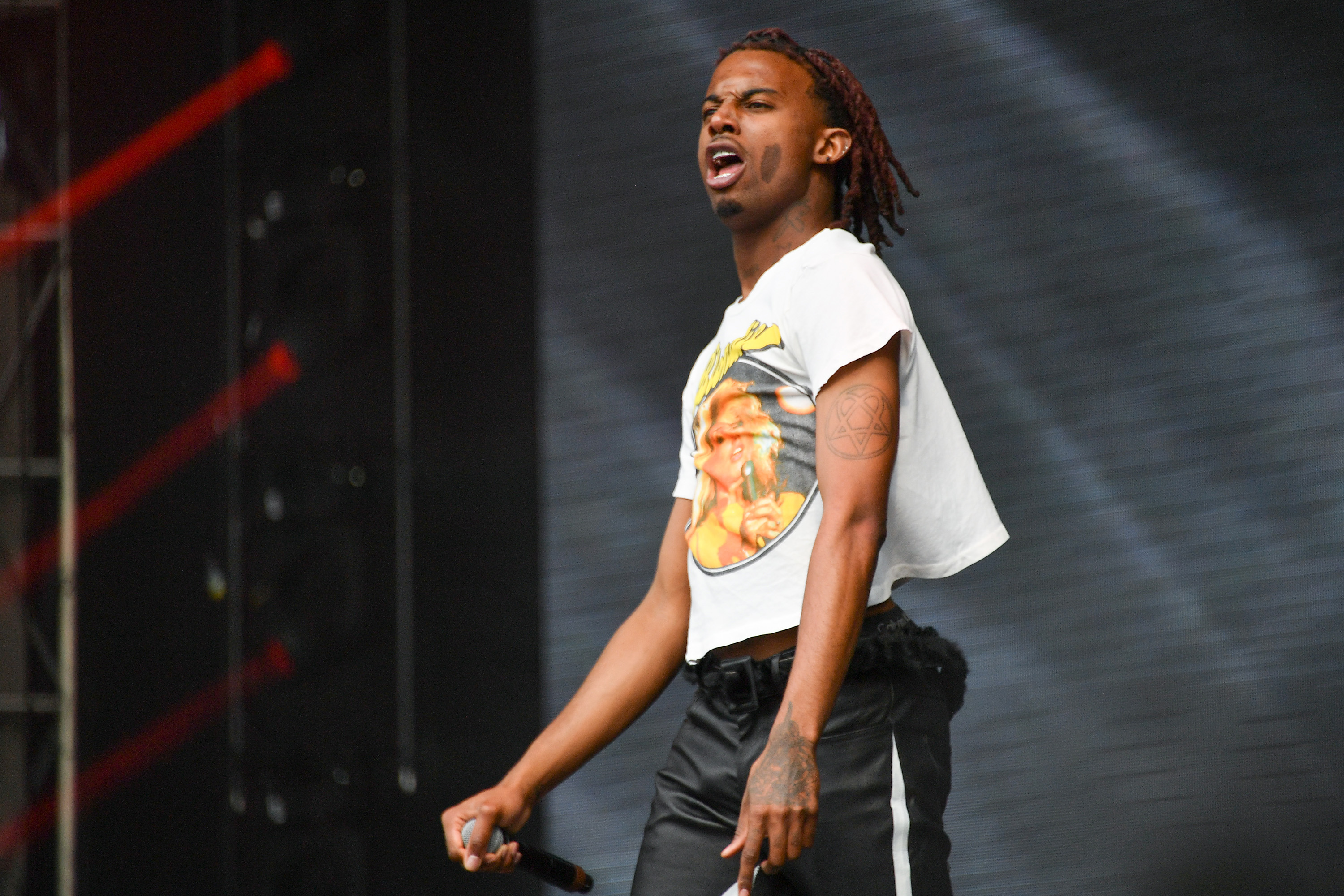 Playboi Carti Hugs Fan After Pulling Security Guards Off Of Him: Watch