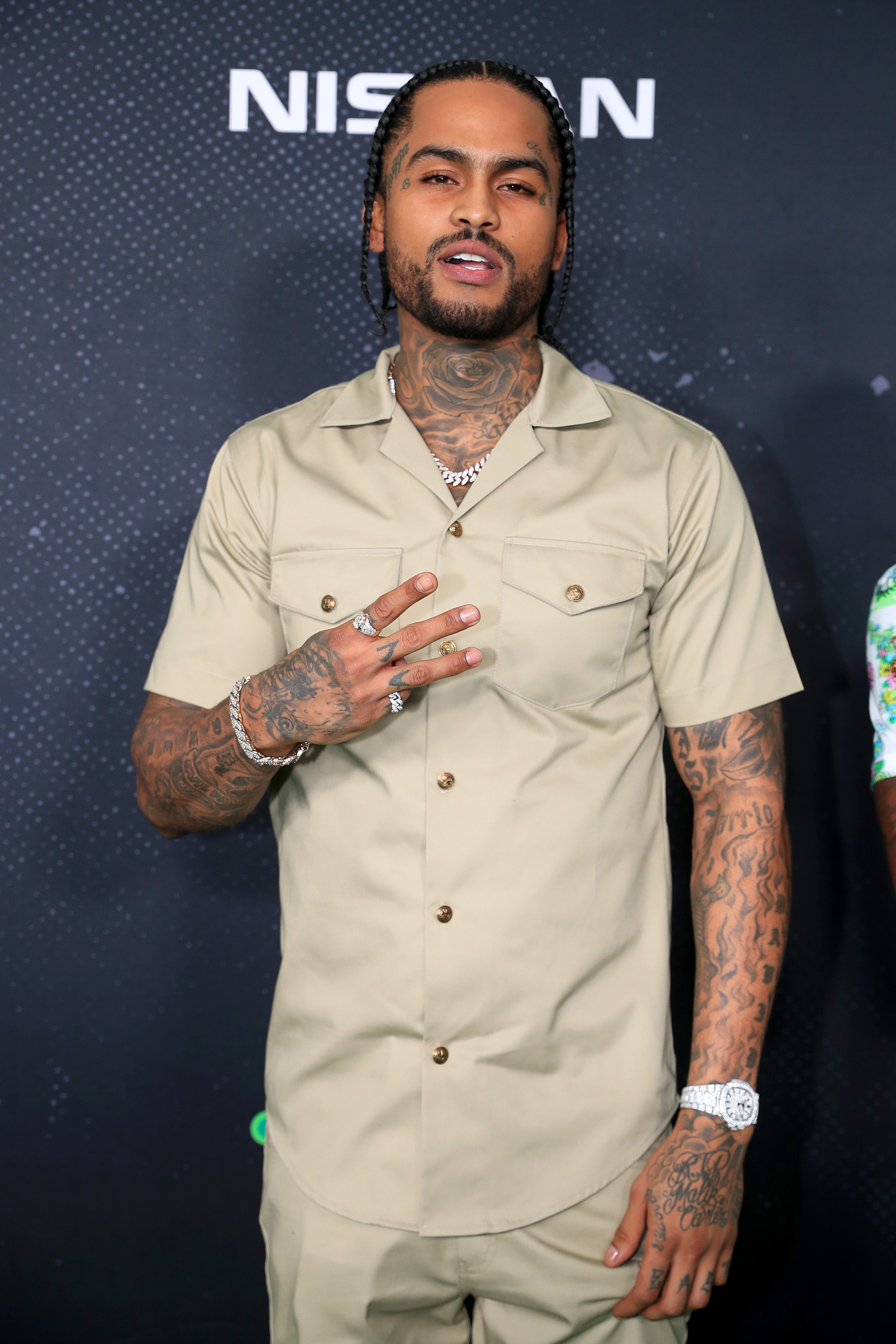 Dave East Tattoos His Baby Mama's Name On His Neck