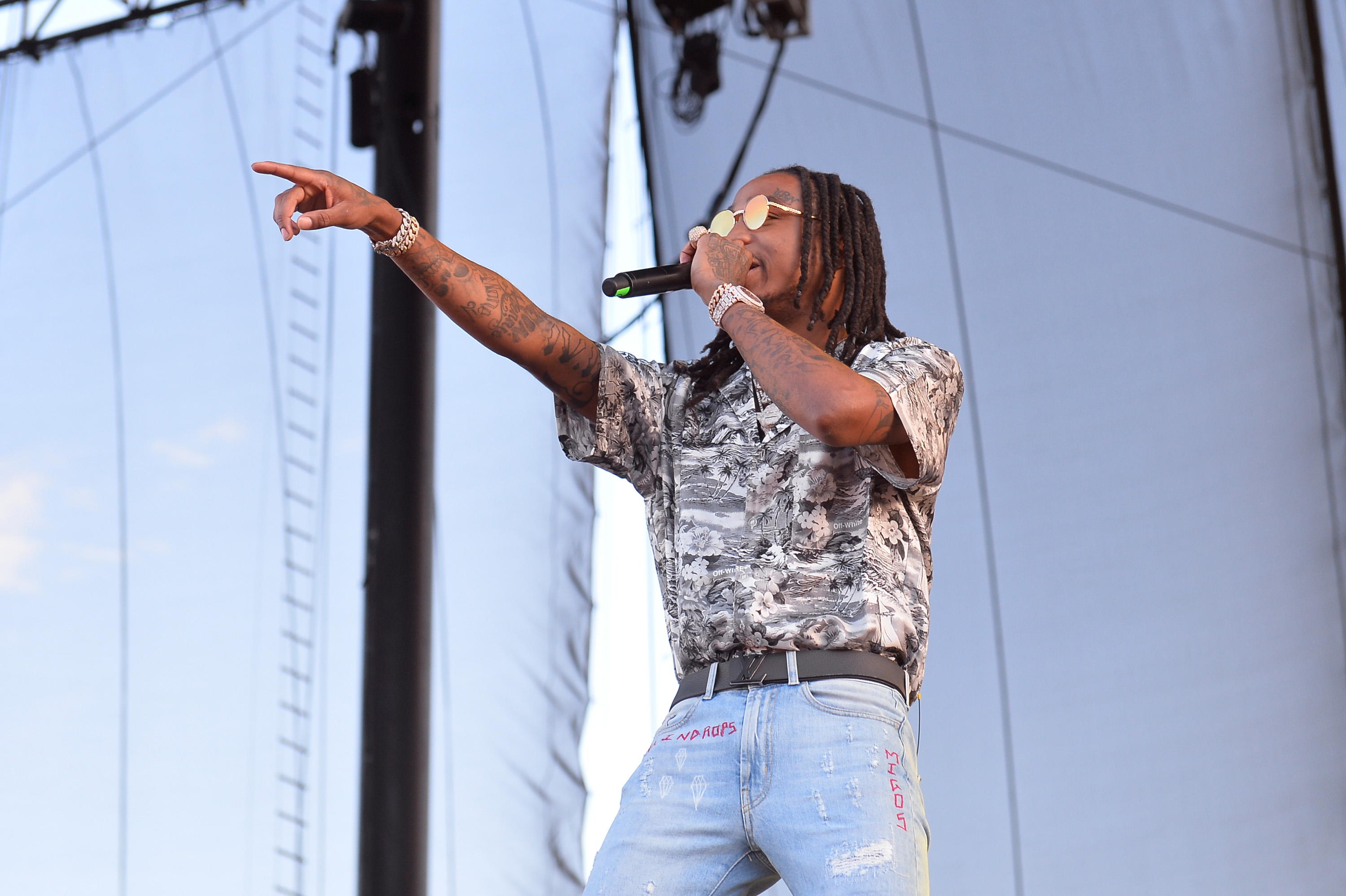 Quavo Cops A New Iced-Out Grill, The Internet Has Opinions