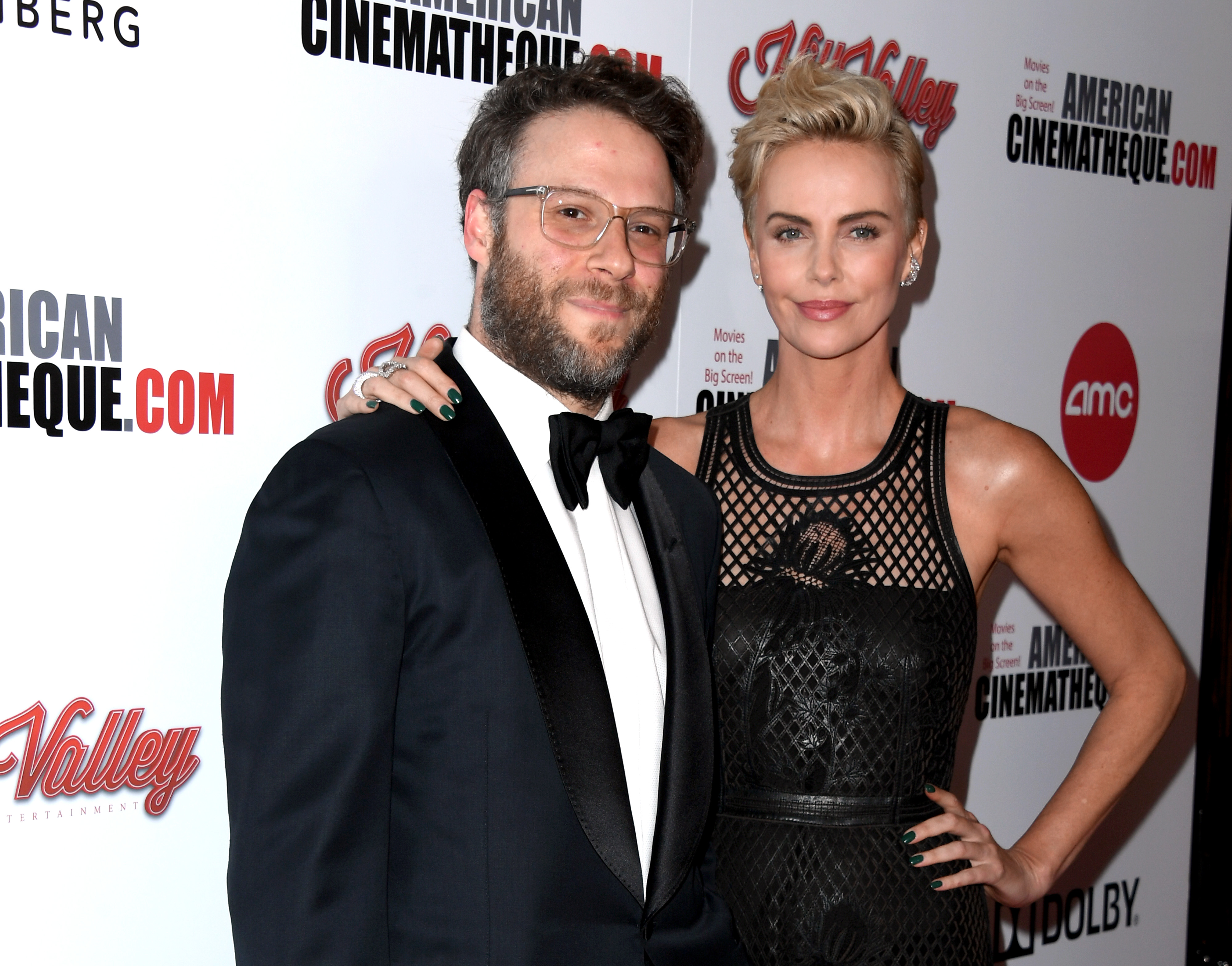 Seth Rogen & Seth MacFarlane Roast Charlize Theron At Award Ceremony