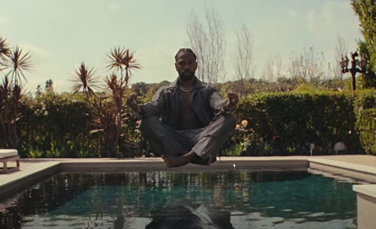 Big Sean Levitates Above His Pool In "ZTFO" Video With Travis Scott